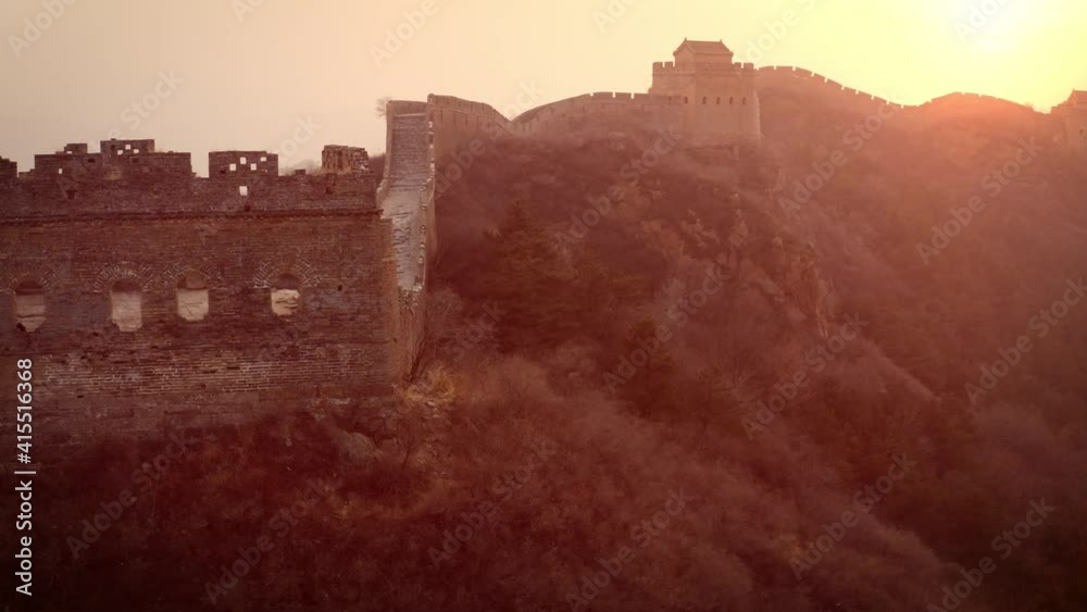 Flying over the Great Wall of China at sunset Stock Video | Adobe Stock