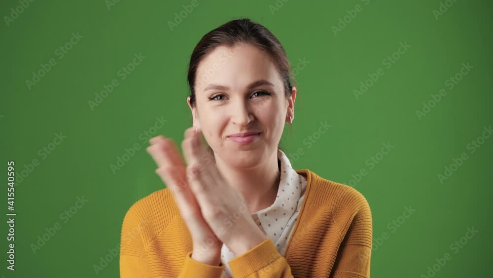 Woman applause. Portrait of positive smiling woman on chroma key ...