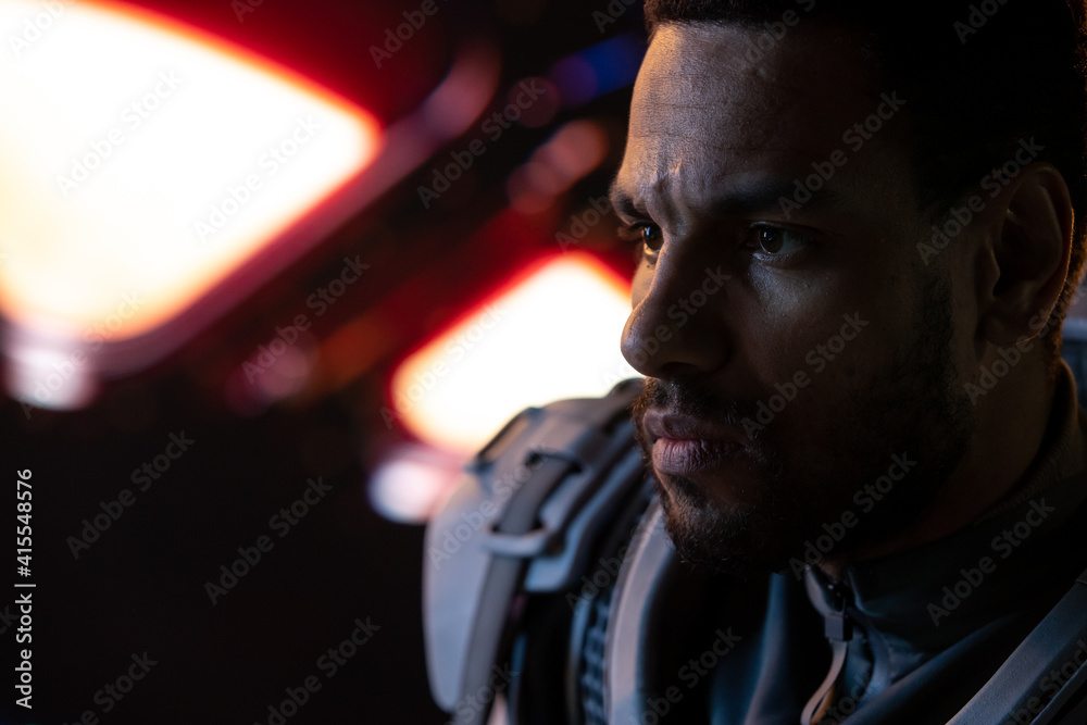 Portrait of African American Black male astronaut inside spaceship ...