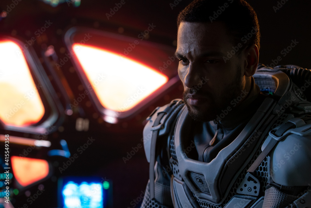Portrait of African American Black male astronaut inside spaceship ...