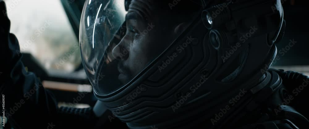 CU Portrait of African American Black male astronaut inside spaceship ...