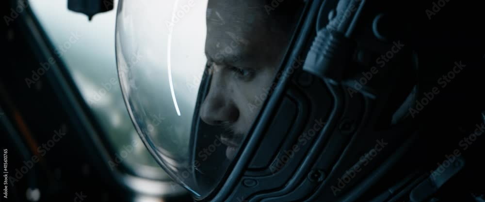 CU Portrait of African American Black male astronaut inside spaceship ...