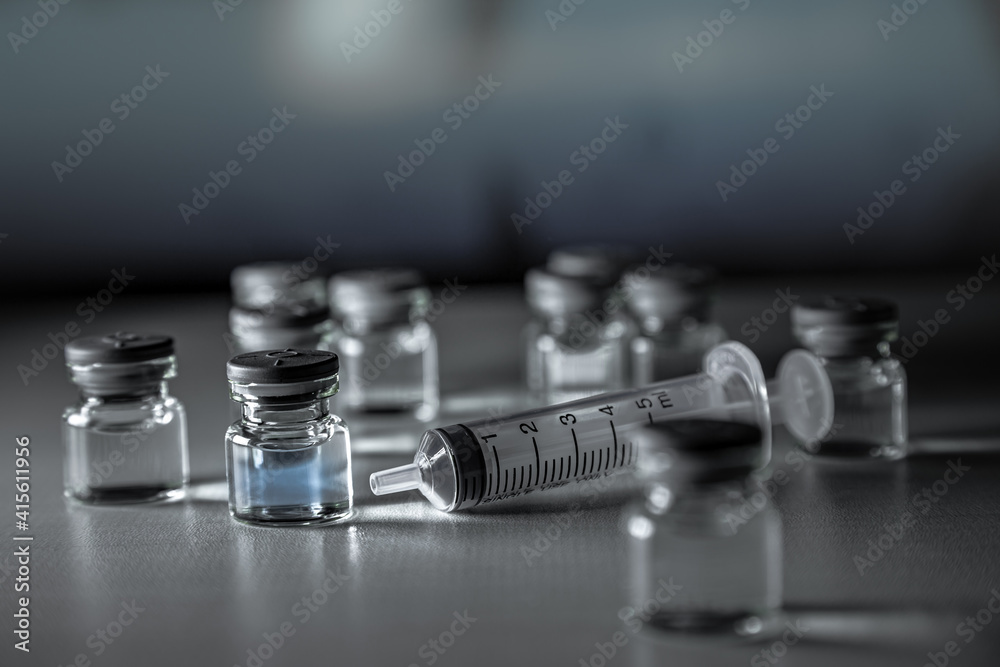 Vaccine prototype Bottle of covid-19 and Syringe. Coronavirus Vaccine ...