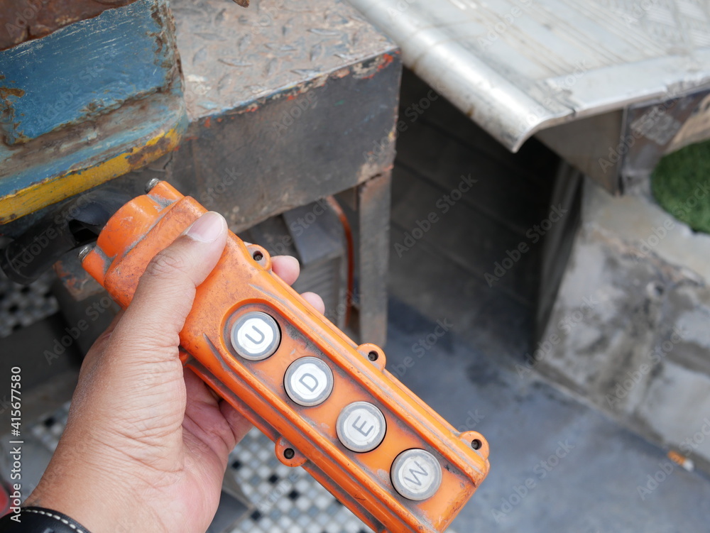 hand holding controller switch lift of transport vehicle. Stock Photo ...