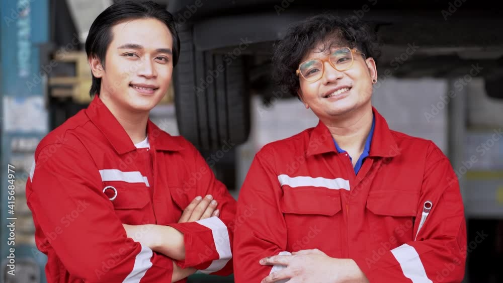 portrait of worker men staff of auto service standing confident in ...