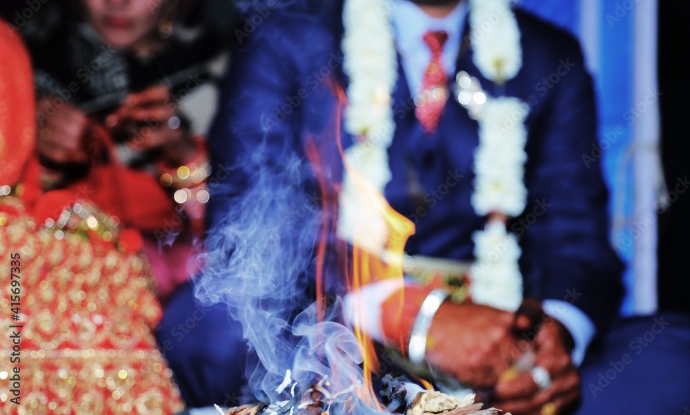 smoke of flame in Indian ritual or Indian wedding selective focus Stock ...