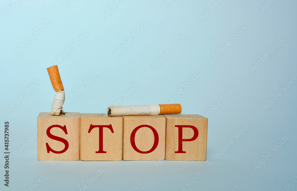 Stop smoking concept, cigarettes and STOP text on wooden blocks. World ...