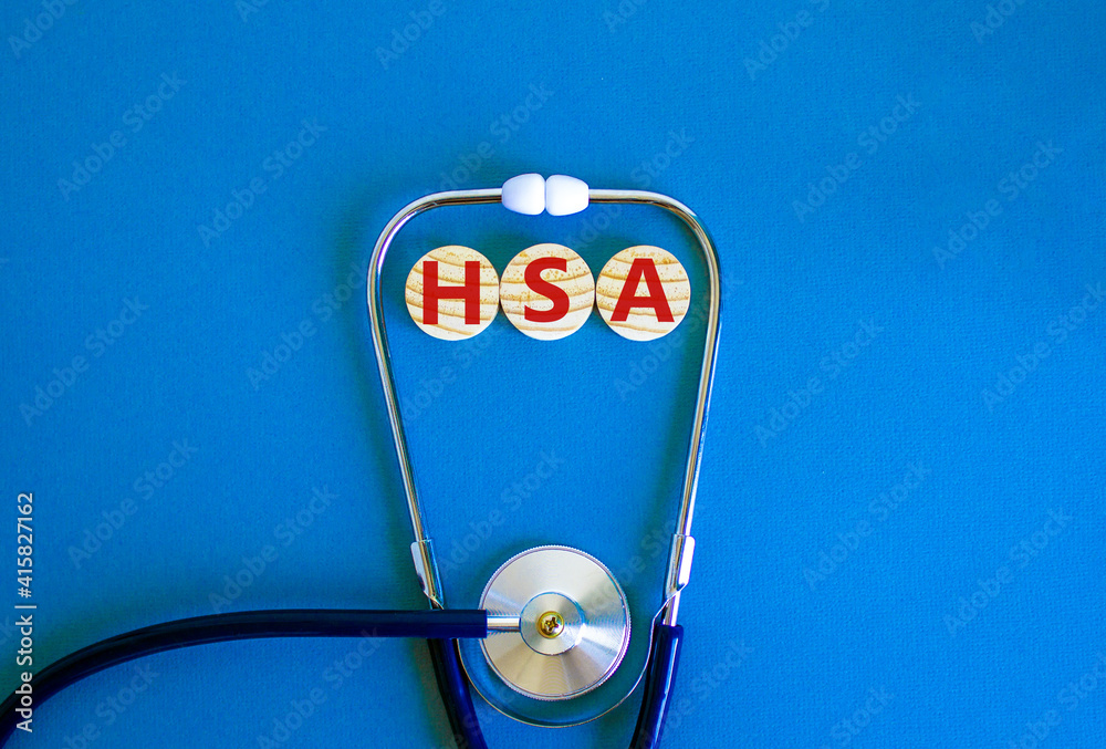 HSA, health savings account symbol. Wooden circles with words 'HSA ...