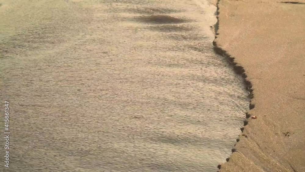 4K coastal sand erosion on beach after heavy rain as water carved her ...
