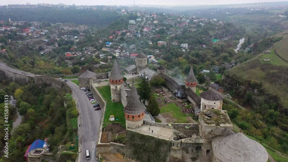 medieval castle and fortifications on the territory of a small town. a ...