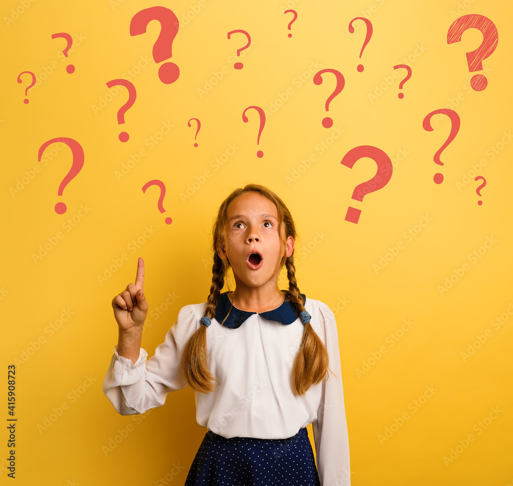 Young student is with shocked expression and indicates a lot of ...