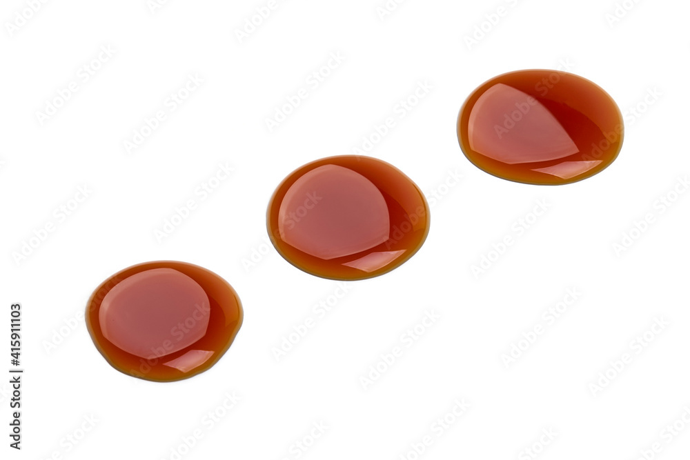 Syrup drops, isolated on white background. High resolution image Stock ...
