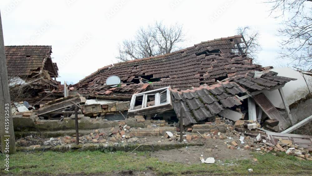 Collapsed and destroyed building after devastating earthquake. Debris ...
