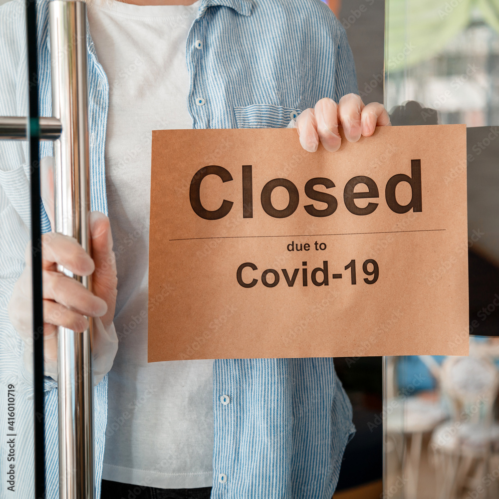 Sign Closed covid 19 lockdown on shop entrance door as new normal ...