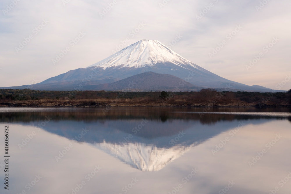 Mount Fuji, 3776m, viewed across Shoji-Ko, one of the lakes in the Fuji ...