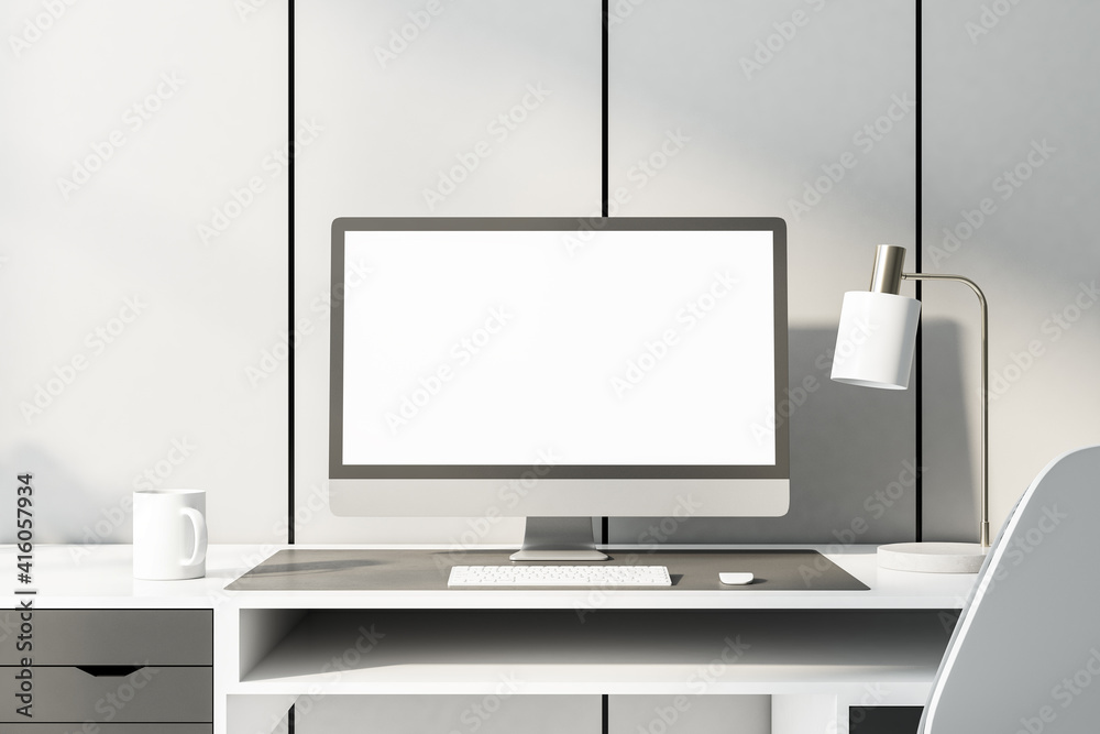 Monochrome style home workplace with blank white computer monitor on ...