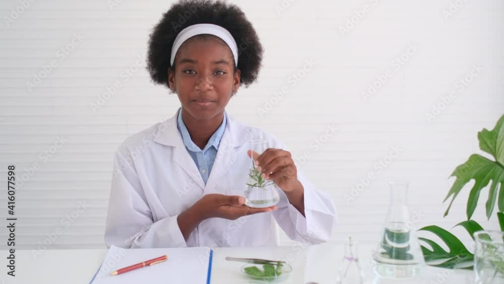 African American young scientist girl present about plant tissue and ...