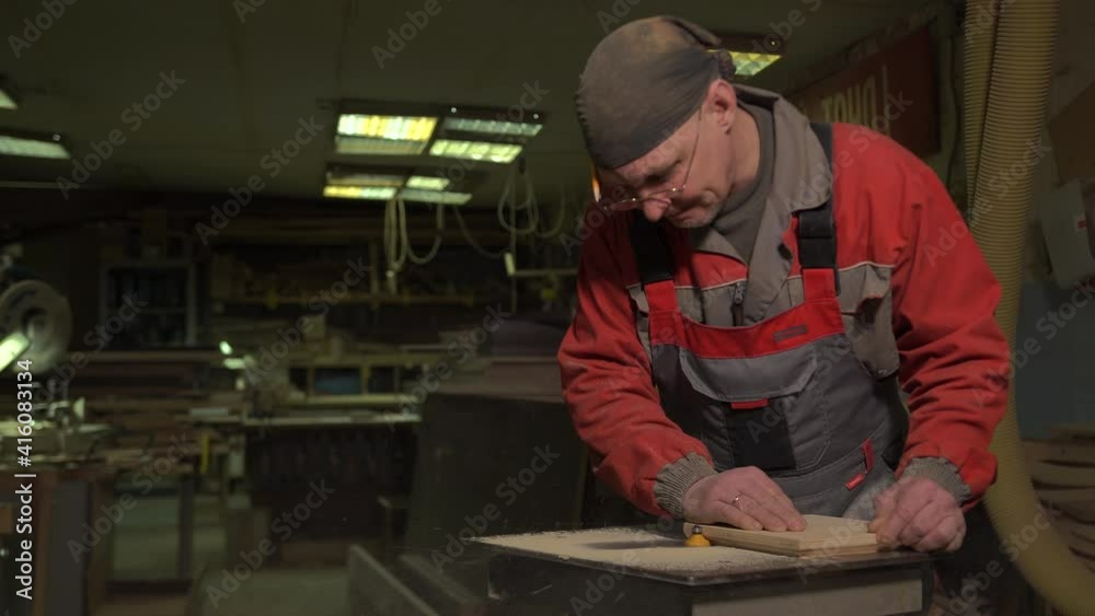 Manufacturing, wood processing plant, furniture factory. Worker ...