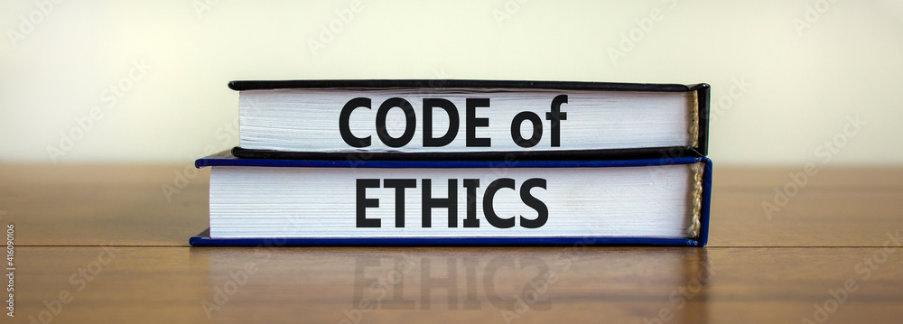 Code of ethics symbol. Concept words 'Code of ethics' on books on a ...