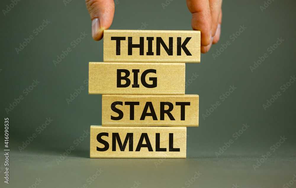 Think big start small symbol. Concept words 'Think big start small' on ...
