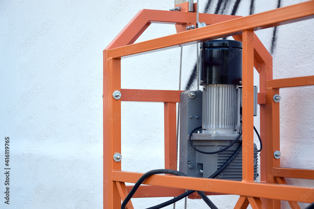 Hoist supply and safety lock as part of suspended wire rope platform ...
