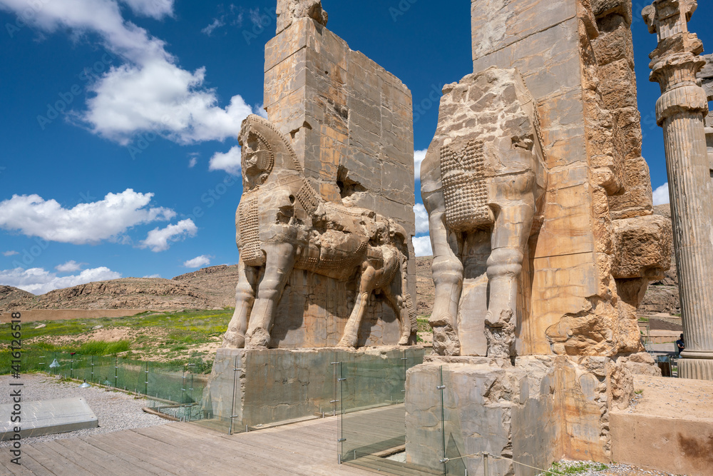 Ruins, statues and murals of ancient persian city of Persepolis in Iran ...