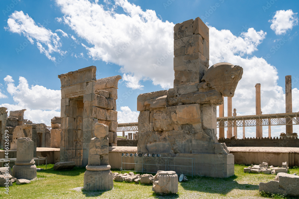 Ruins, statues and murals of ancient persian city of Persepolis in Iran ...