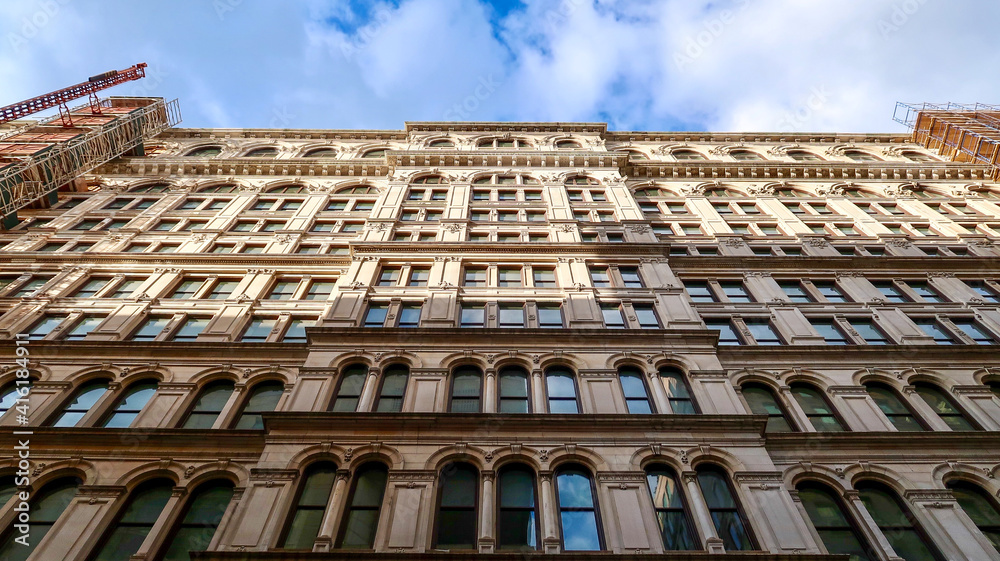 Strong skyline created by masonry building with beautiful window ...