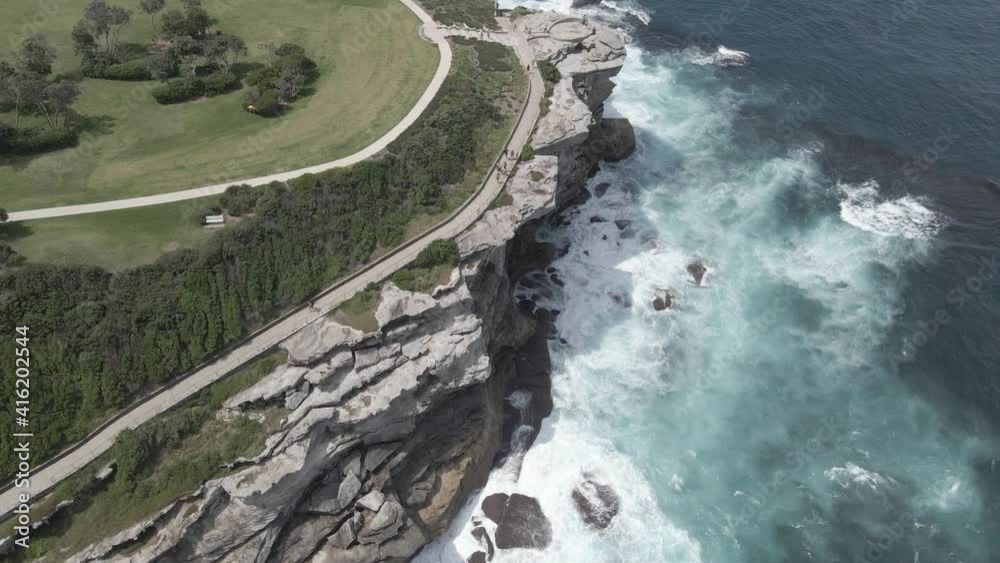 People Walking At Bondi To Bronte Coastal Walk With Breaking Waves In ...