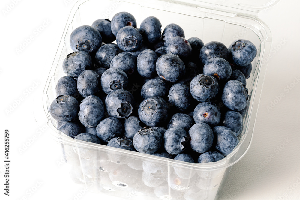 transparent blueberry jar, on white background, with open lid, top view ...