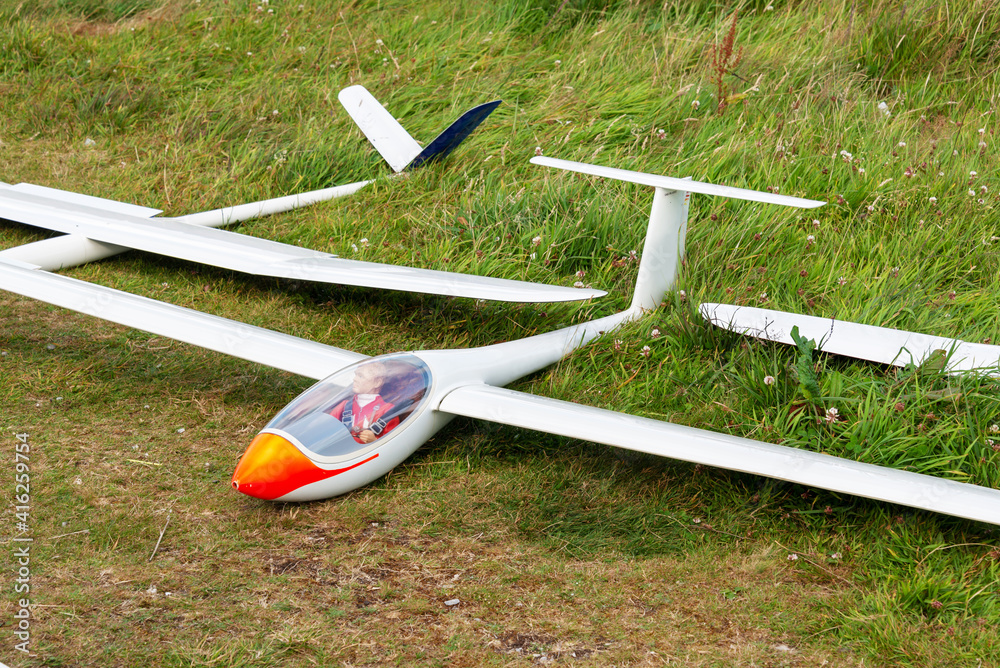 Flying model plane with dummy pilot used for aeromodelling Stock Photo ...
