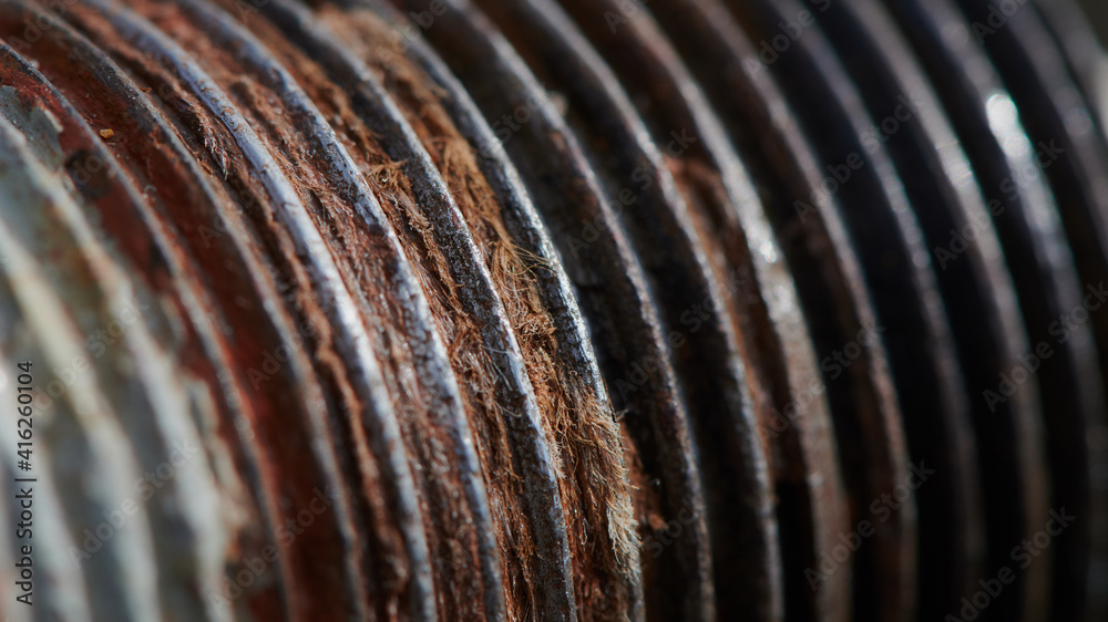 plumbing old rusty water pipe with remnants of sealant and tow on worn ...