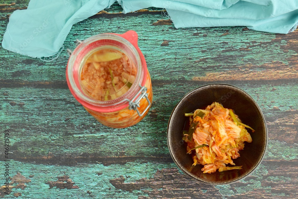 Kimchi, traditional Korean food, fermented Napa cabbage and radish with ...