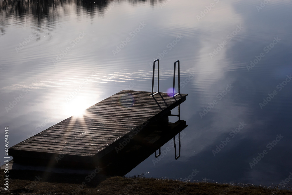 mirror reflection on a lake with bridges on the shore Stock Photo ...