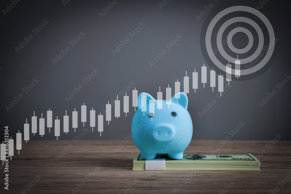 Saving a blue pig on a dollar bill to show wealth through saving money ...