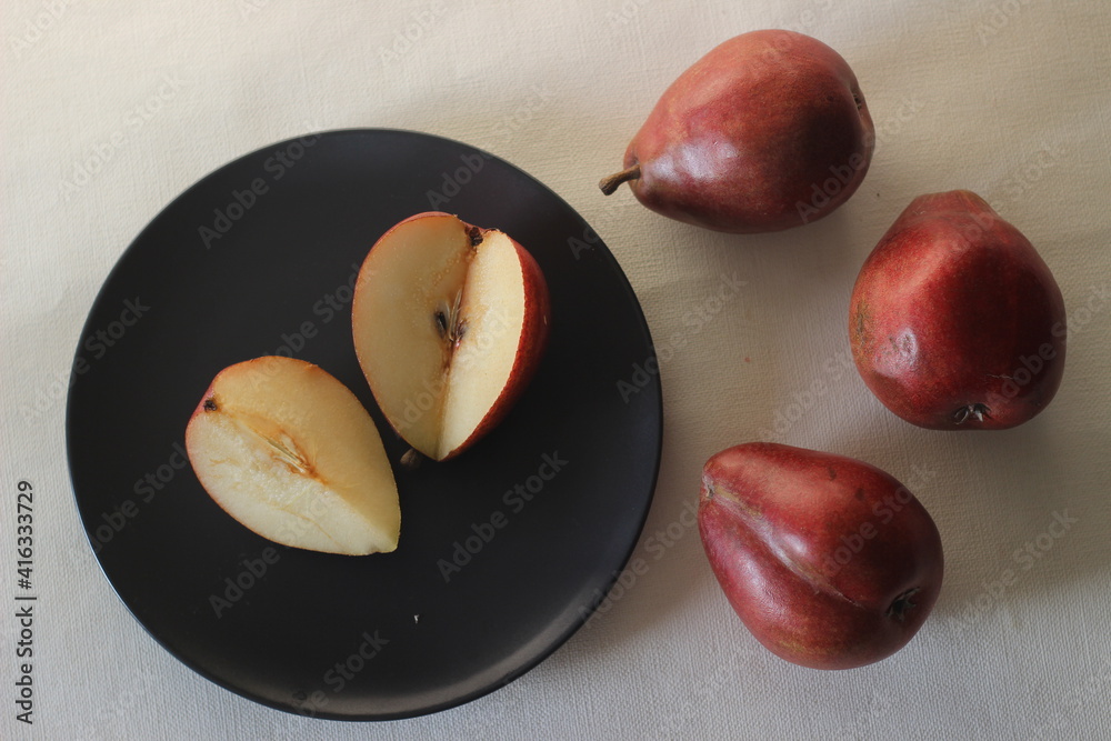 The Red Bartlett pear carries a true pyriform pear shape. A rounded ...