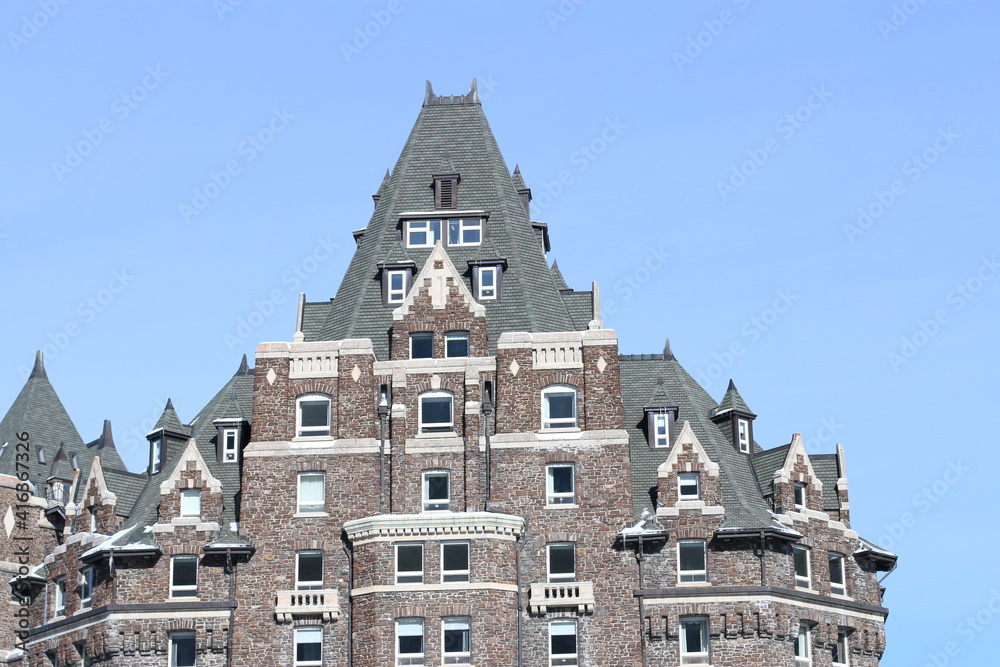 Historical Banff Springs Hotel. Canada's grand railway hotel. Rocky Mountains range. National ...