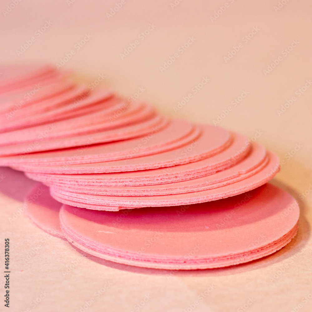 Pink wafers put on the table, strawberry flavor wafers. Typical sweet ...