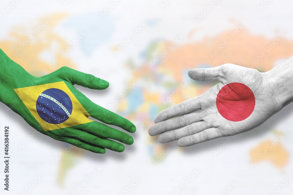 Brazil and Japan - Flag handshake symbolizing partnership and ...