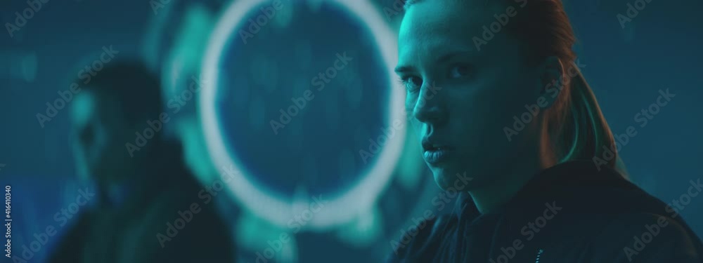 Video Stock Female Hacker working on laptop at night in the modern ...