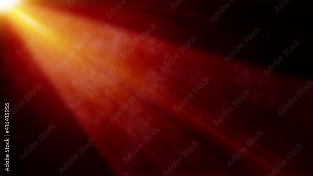 Dramatic orange red light beam with flying dust particles and smoke ...
