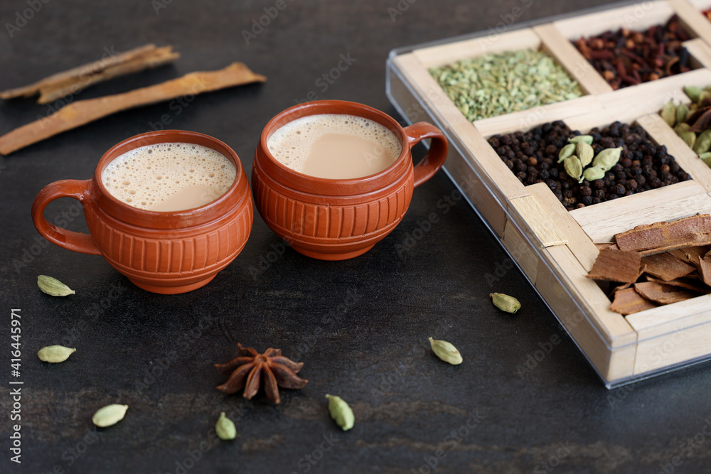 Top view of Indian herbal Masala Chai or traditional beverage tea with ...
