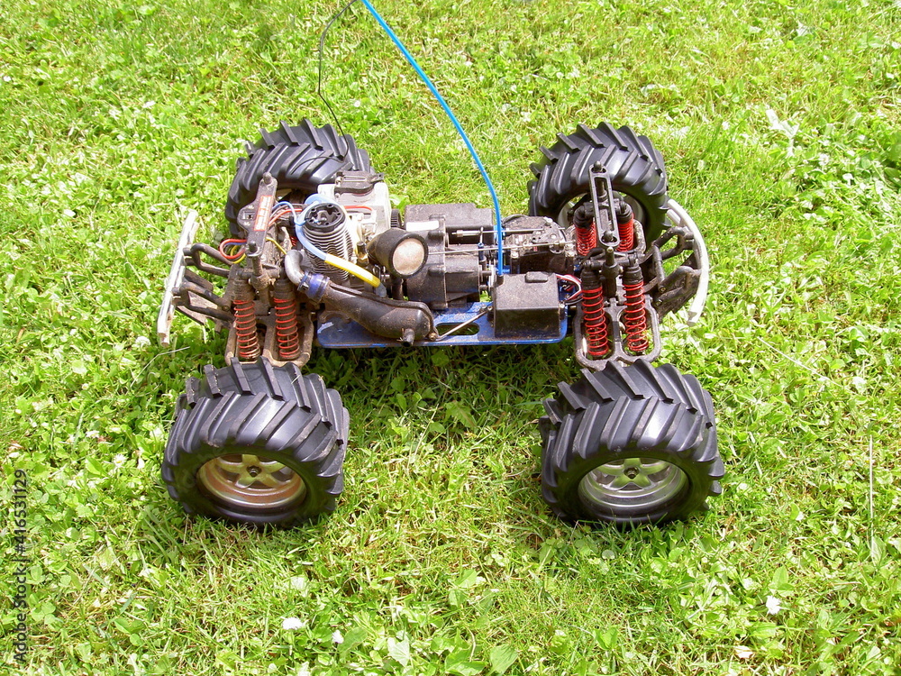 Remote-controlled model of off-road car with an internal combustion ...