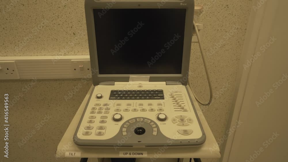 ultrasound machine in human hospital with black screen and keyboard for ...
