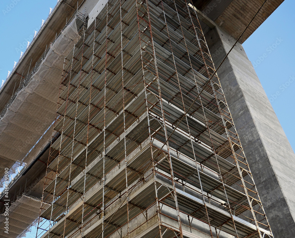 Scaffolding on a reinforced concrete bearing structure of a motorway ...
