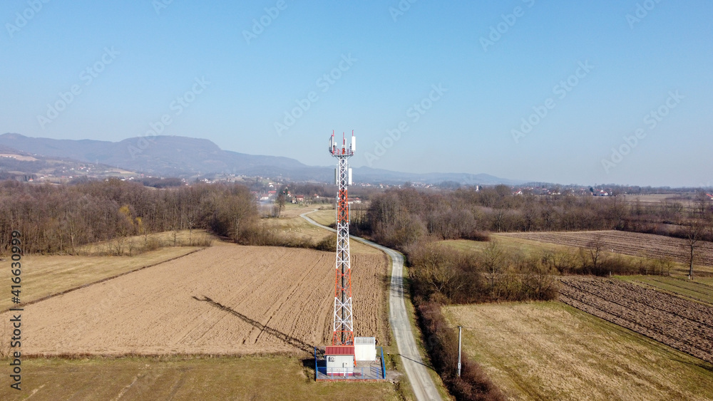Aerial drone view of GSM and radio telecommunication tower. Cell phone tower. Base transceiver ...