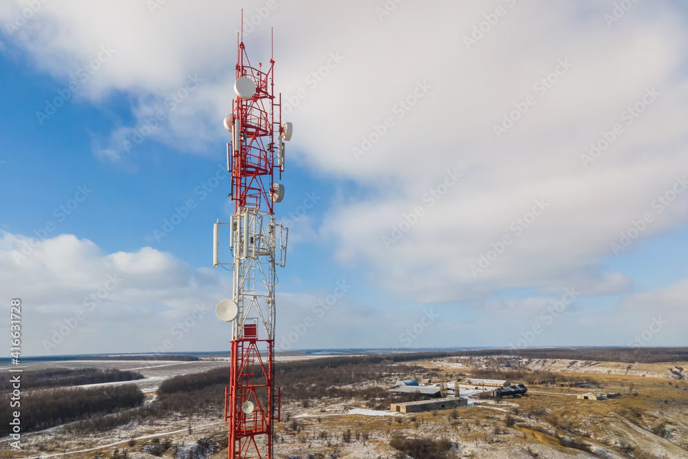 Tower communication in a rural location. Telecom tower antenna and satellite transmits the ...