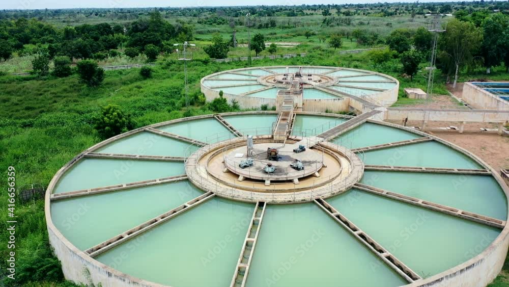 Green tanks filled with water at the Ajiwa dam in the Katsina State in ...