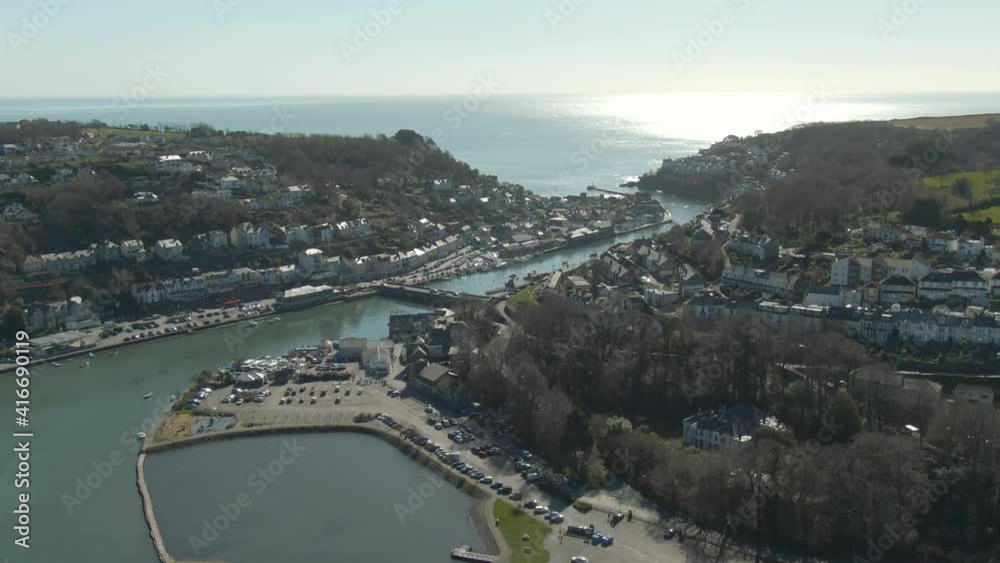 Aerial of Looe town, pointing out to sea. West looe car park and mill ...