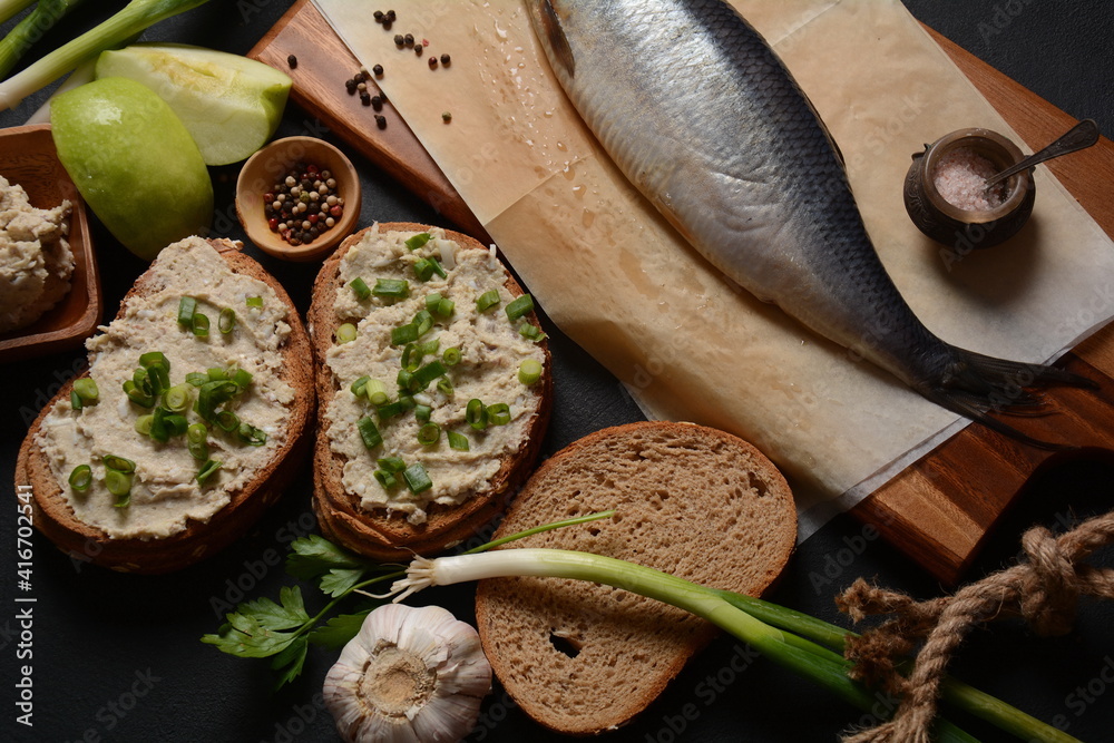Traditional Jewish snack vorschmack or forshmak with bread and green ...